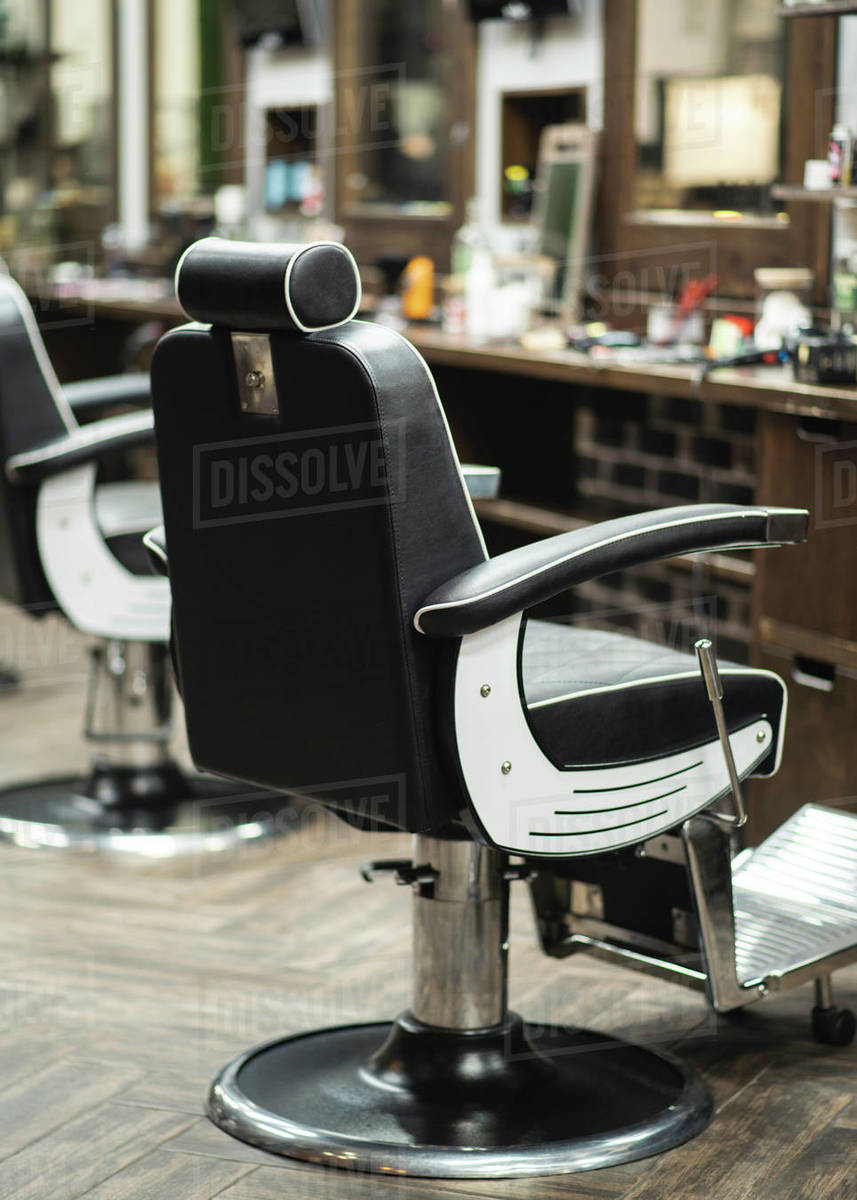 Empty chair at barber shop - Stock Photo - Dissolve