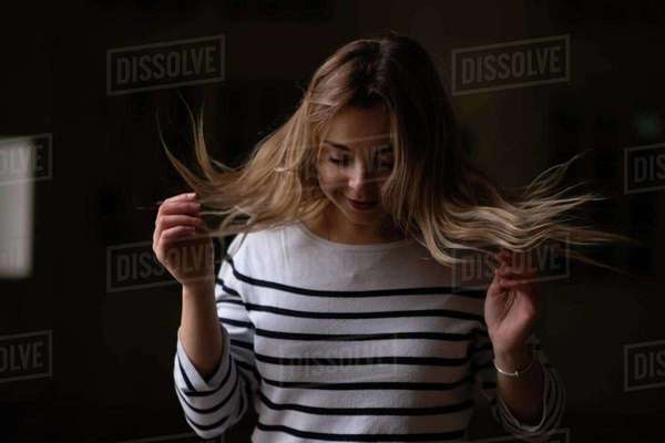 Portrait of a woman with windswept hair - Royalty-free Stock Photo ...