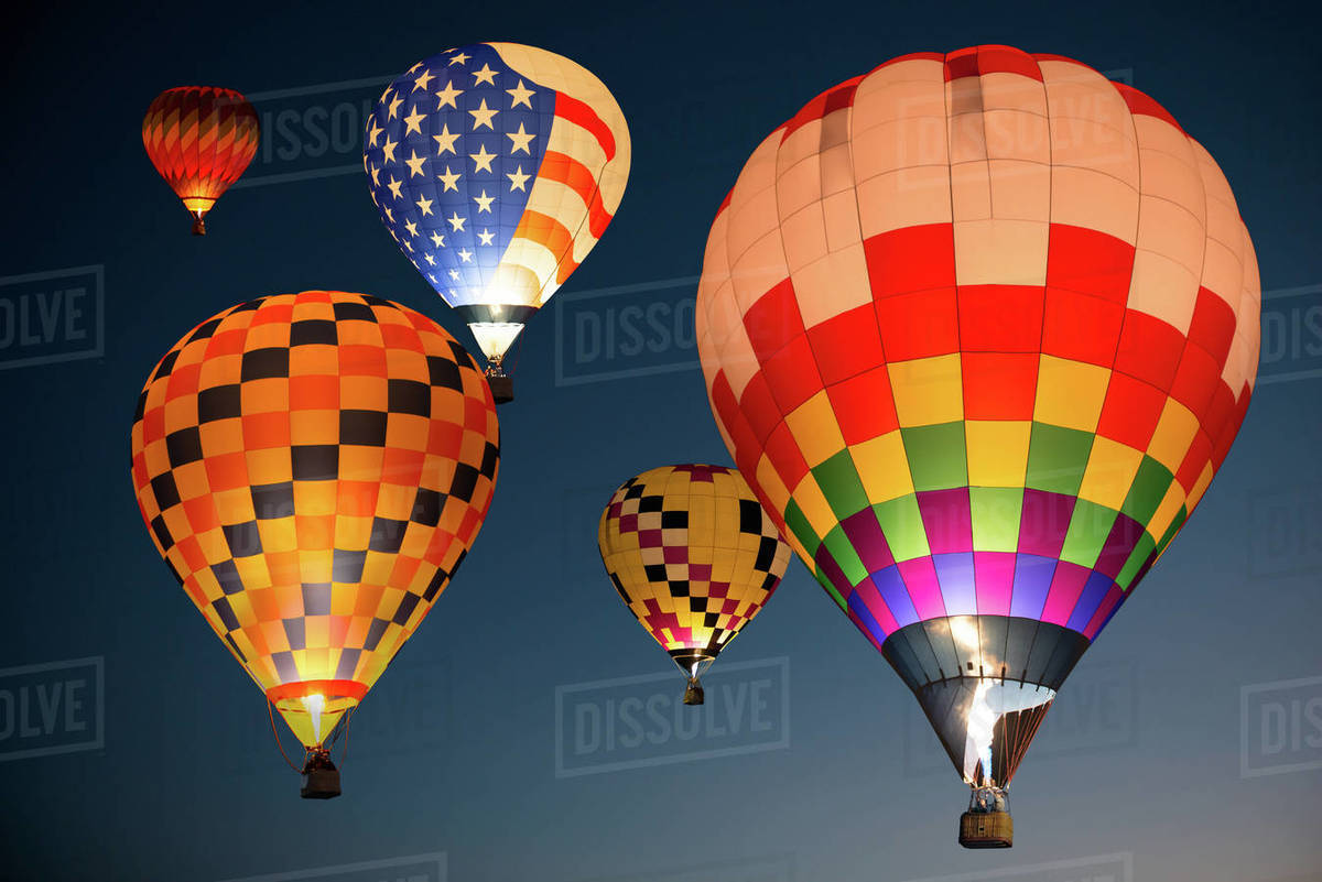 Close-up of Hot Air Balloons in flight at dawn, international balloon ...