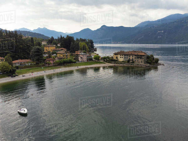 Aerial view of peninsula and village on lake Como, Lierna, Lecco ...