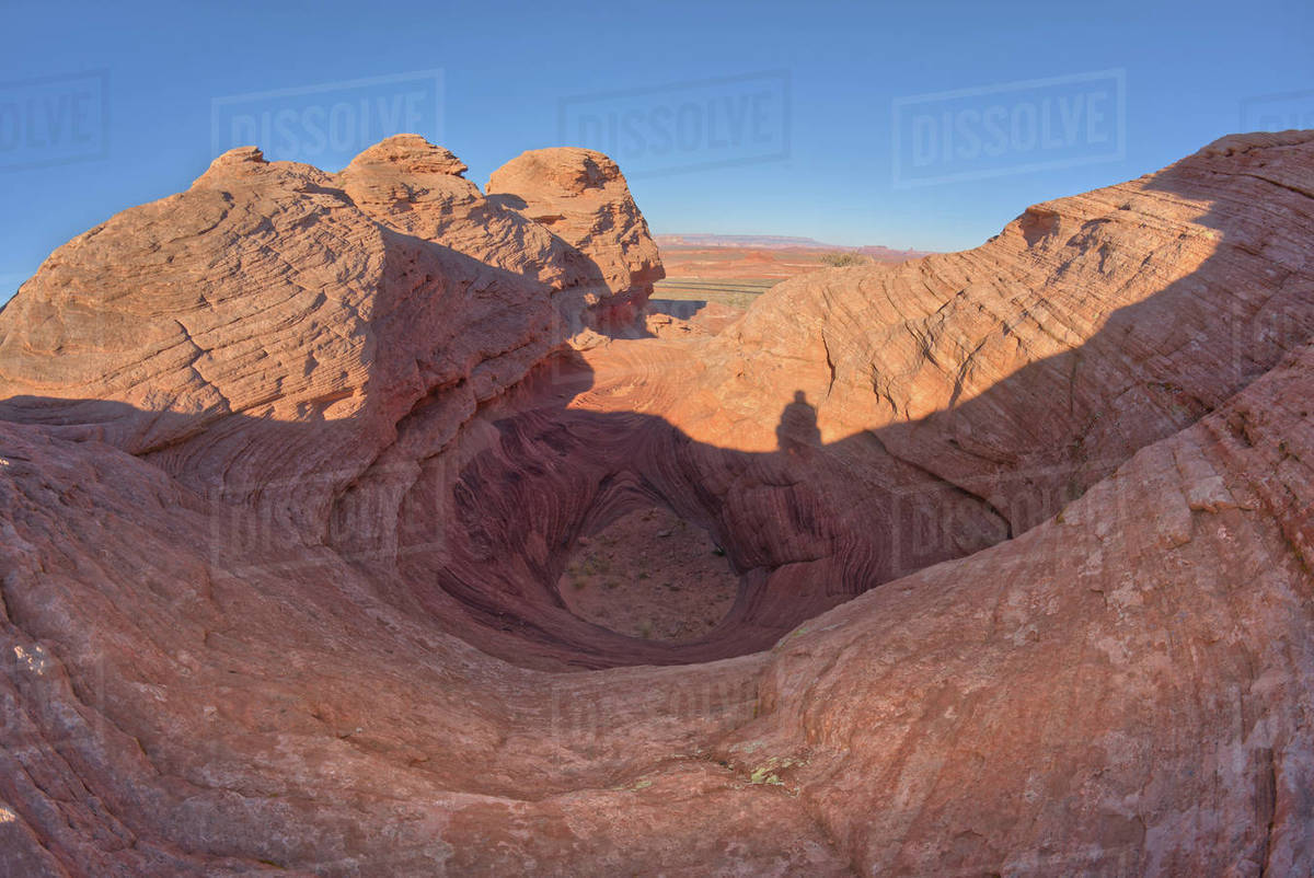 Silhouette of a person on Shiva Nandi Rock, Beehive Trail, New Wave ...