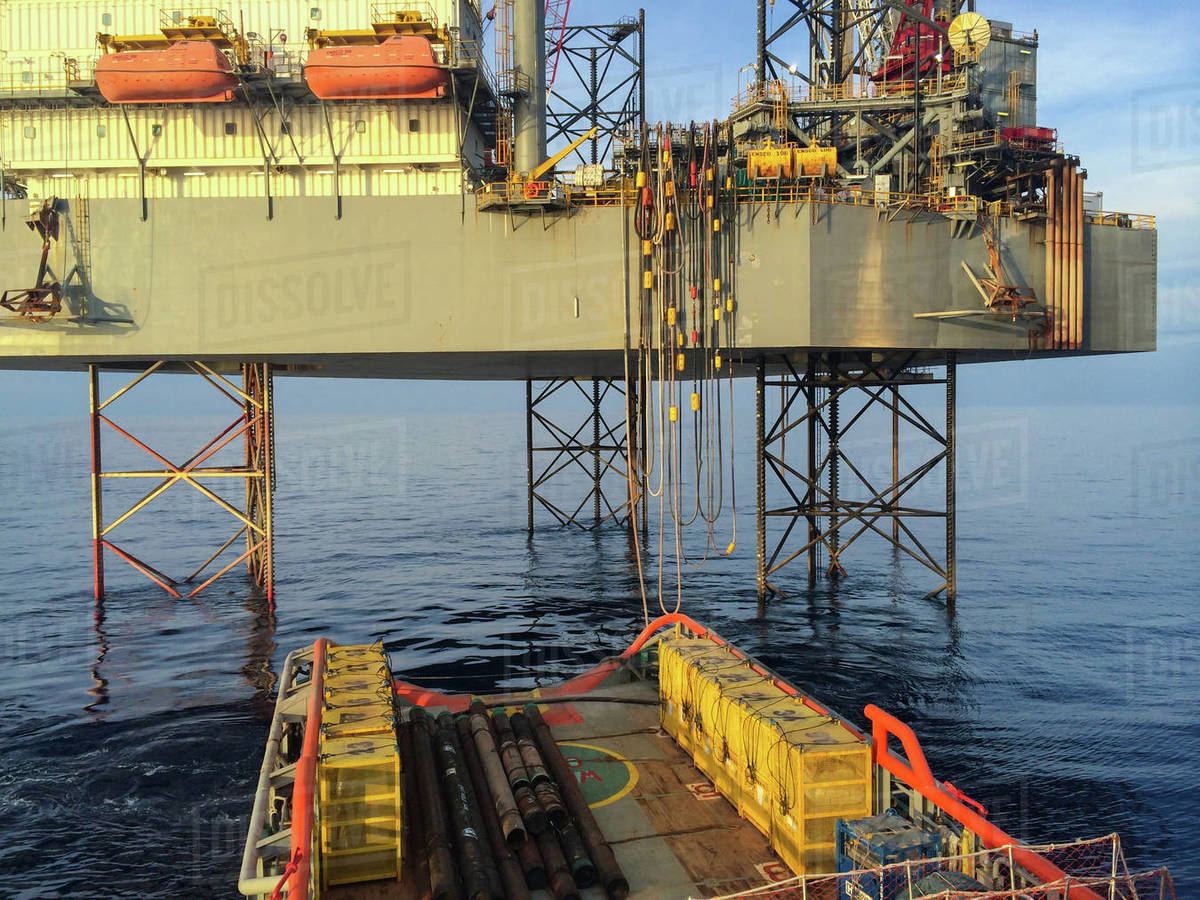 Oil rig support vessel approaching oil rig - Royalty-free Stock Photo ...