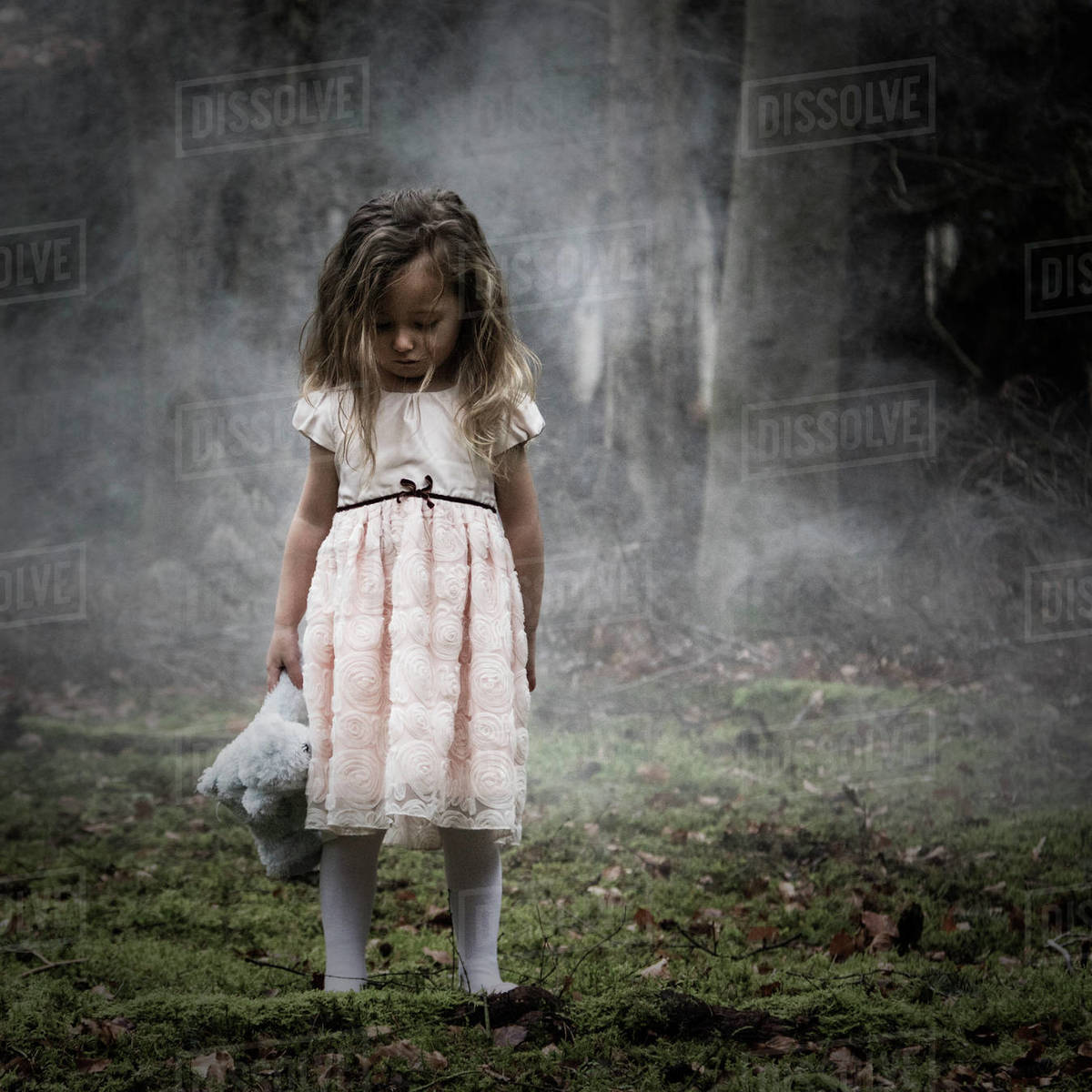 Sad girl in the woods - Royalty-free Stock Photo | Dissolve