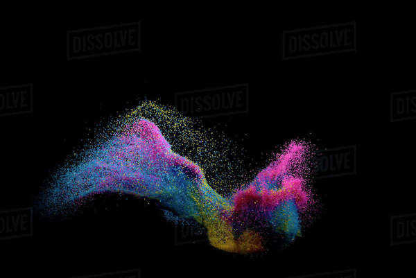 Multi-colored sand against black background - Stock Photo - Dissolve