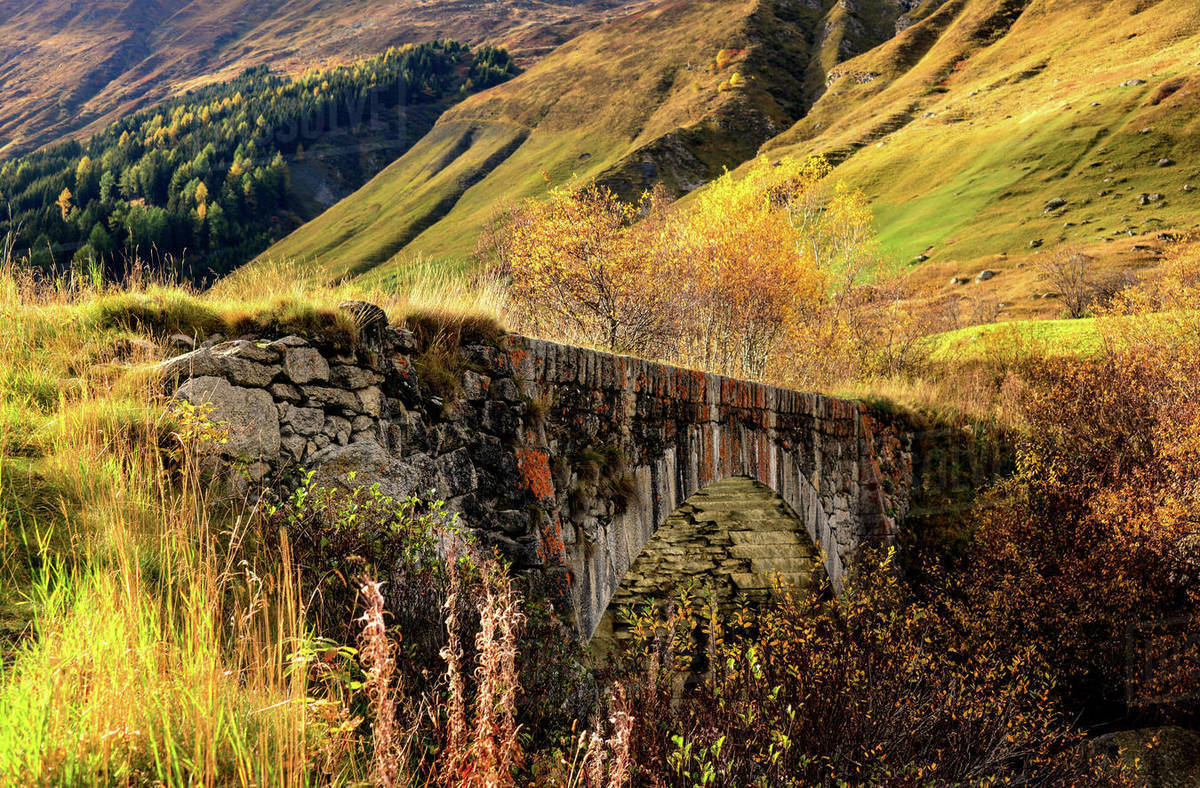 Bridge in rural landscape, Realp, Uri Alps, Switzerland - Royalty-free ...