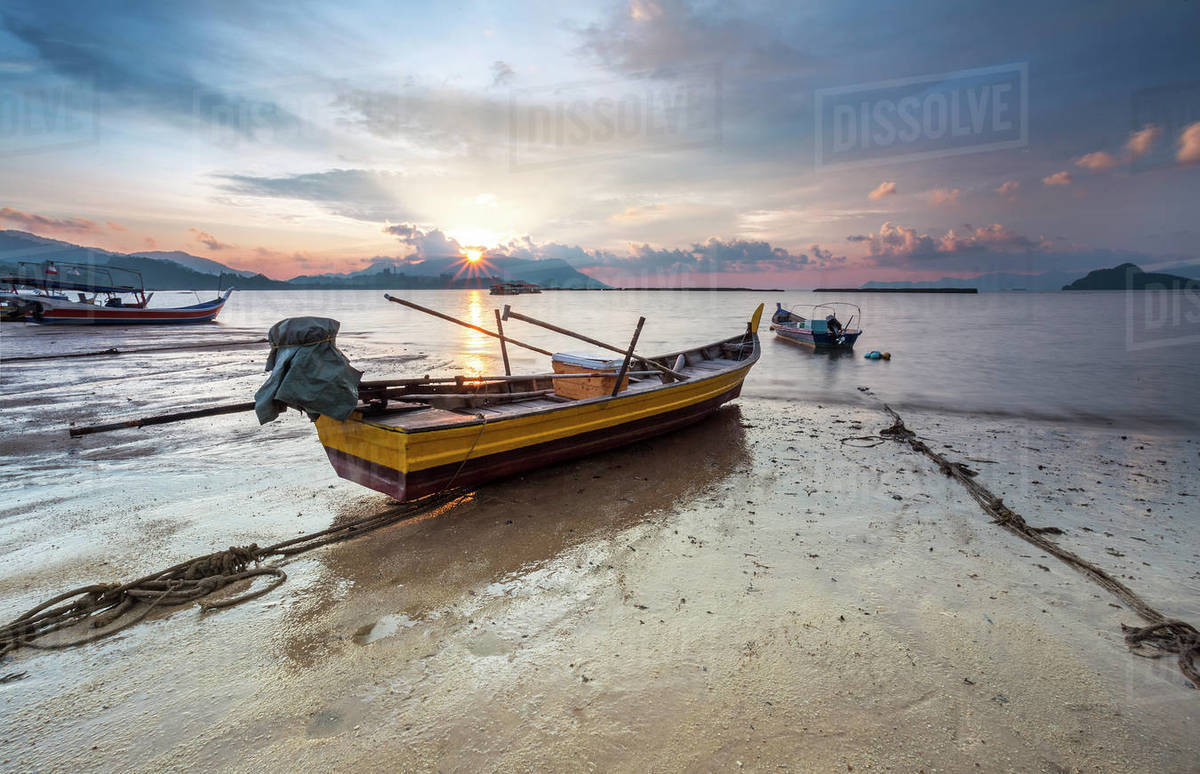Fishing boats at Black Sand Beach, Langkawi, Malaysia - Royalty-free ...