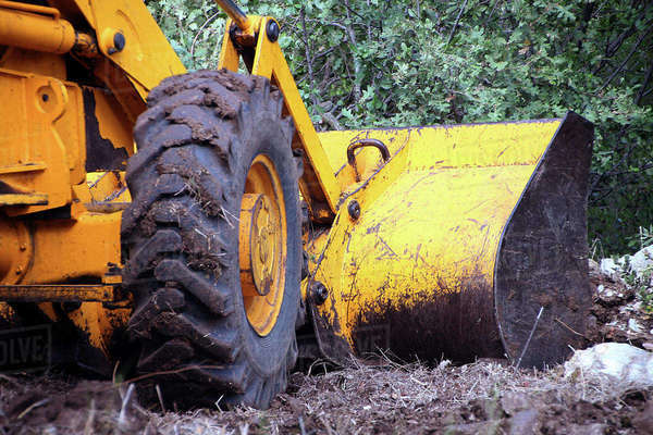 Mechanical digger excavating soil - Royalty-free Stock Photo | Dissolve