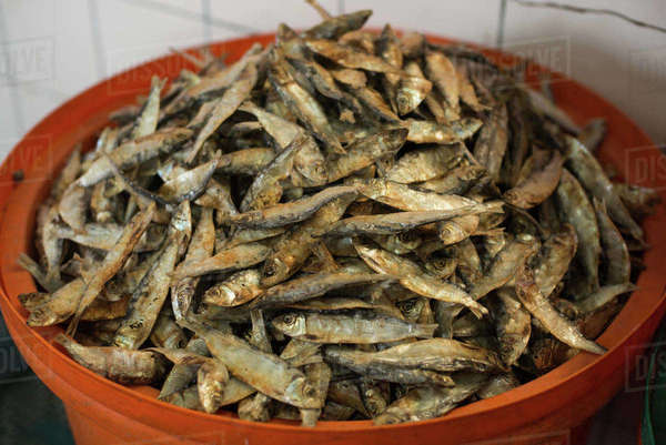 Air-dried fish in a bucket at fish market, Dubai, UAE - Royalty-free ...