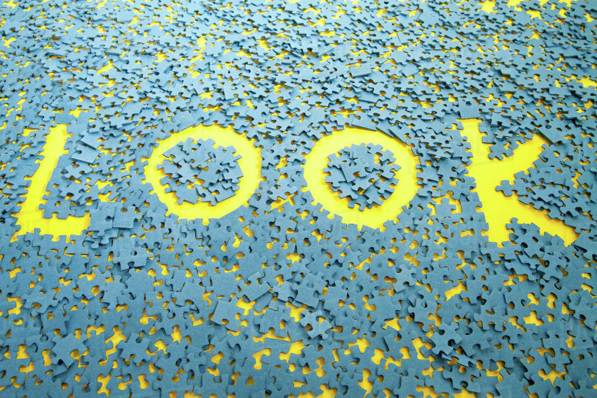 The word Look spelled out between jigsaw pieces - Royalty-free Stock ...