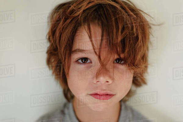 Portrait of a boy with messy hair - Royalty-free Stock Photo | Dissolve