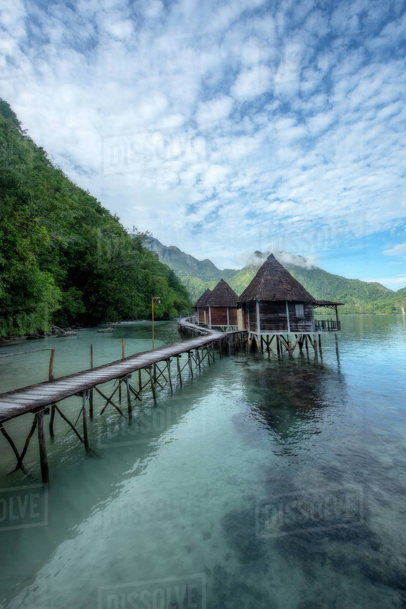 Boat sailing in ocean, Ora Beach, Seram, Maluku Islands, Indonesia ...
