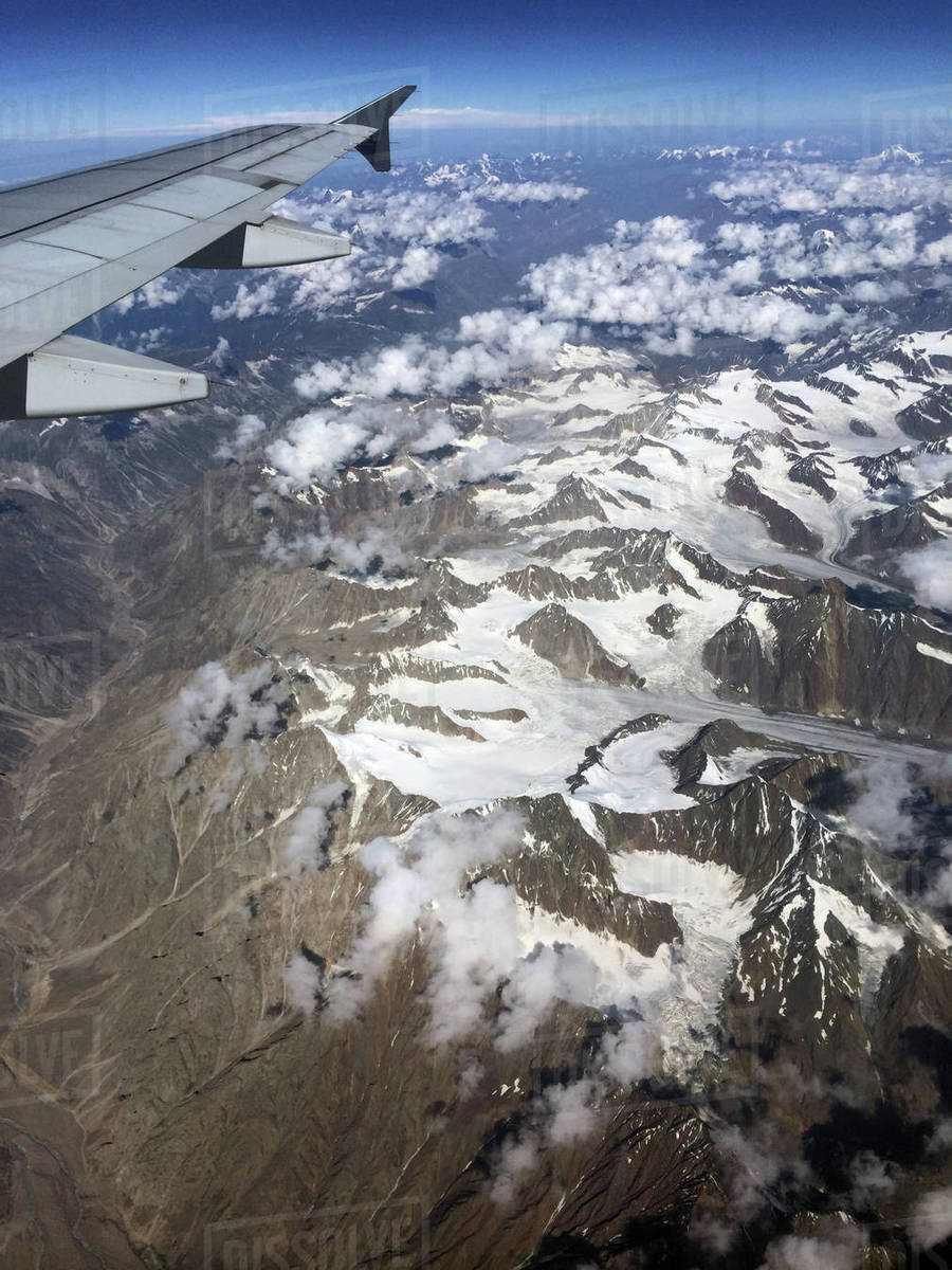 Aircraft wing flying over Himalayas, India - Royalty-free Stock Photo ...
