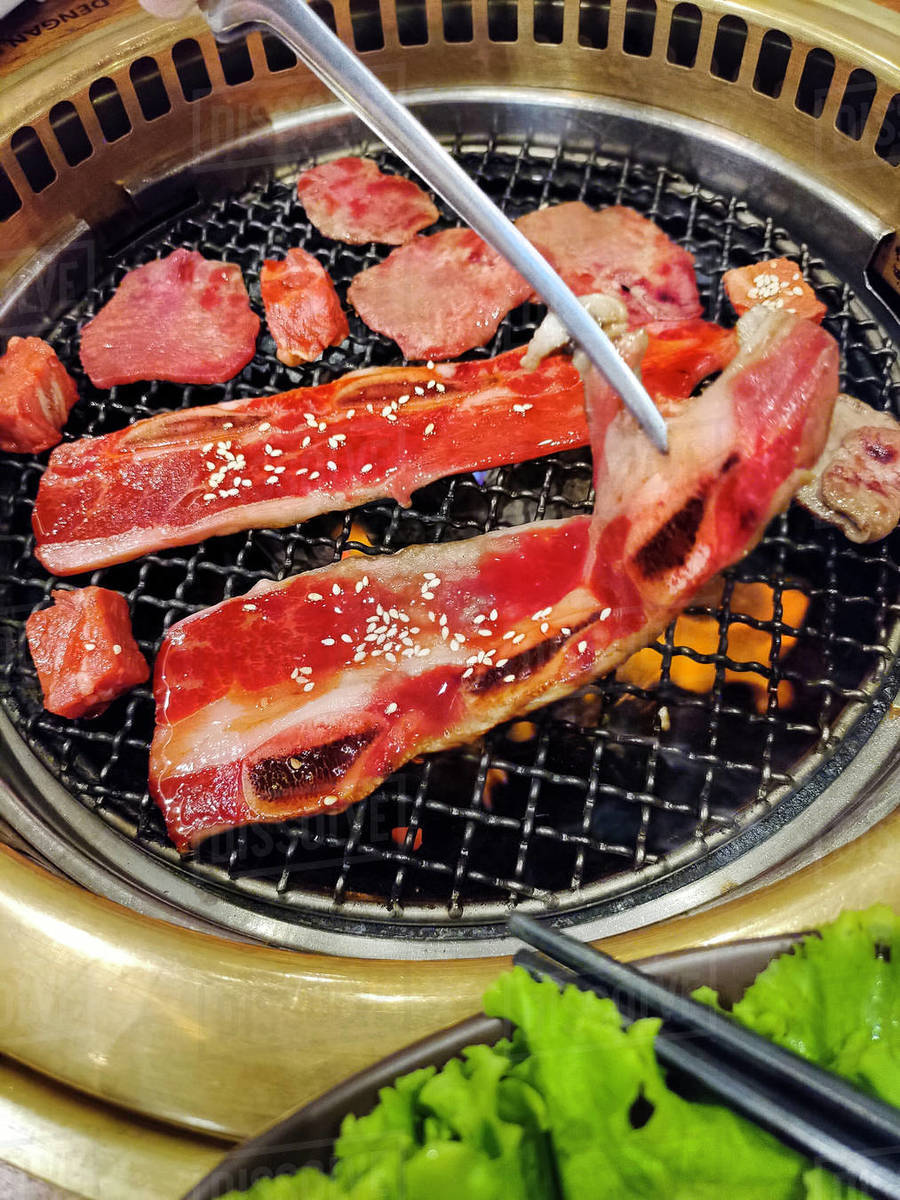 Close-up of meat being cooked on a barbecue - Royalty-free Stock Photo ...