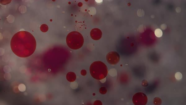 Macro abstract red bubble cells bokeh motion liquid texture background ...