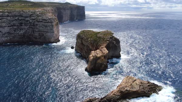 Aerial view over Dwerja Bay on the island of Gozo Malta - 4K Royalty ...