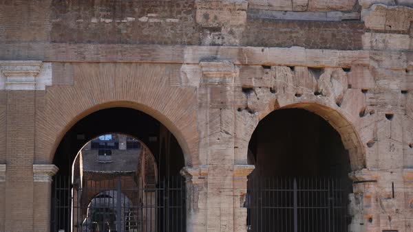 Restored facade of ancient of Roman Colosseum amphitheater on sunny day ...