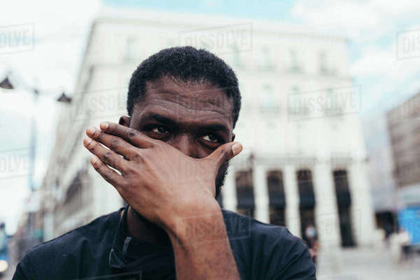 Man crying and protesting at a rally for racial equality against racism ...