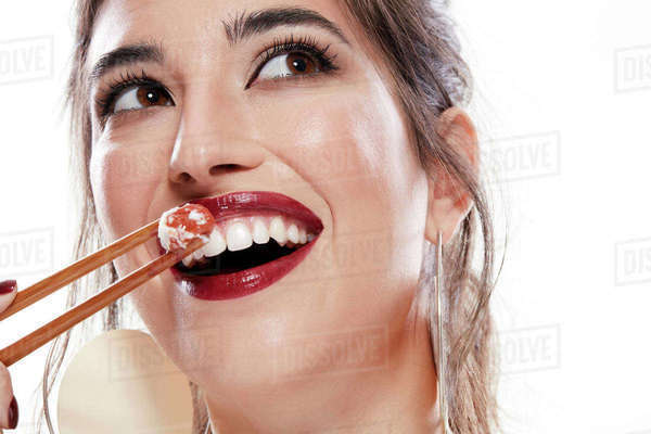 Fancy young woman with red lipstick on opened mouth looking away while ...