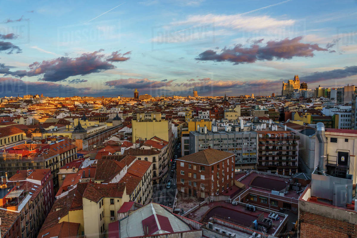 From above breathtaking landscape of city and bright houses roads under ...