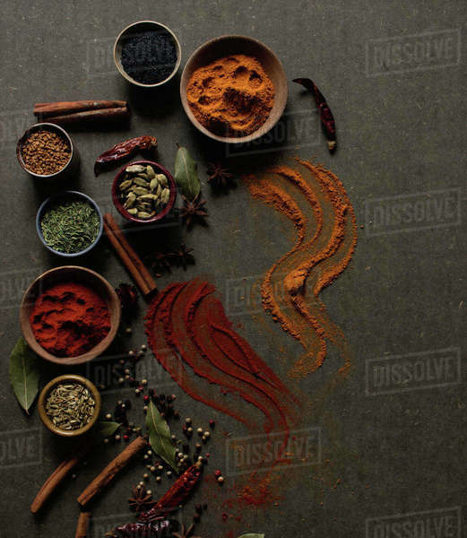 Top view composition with different kinds of natural aromatic spices ...
