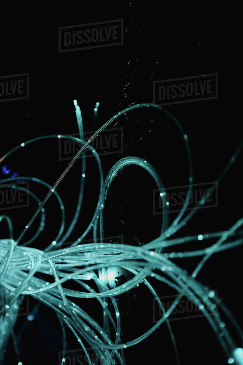 Closeup of abstract blue translucent thin wire with illumination inside ...