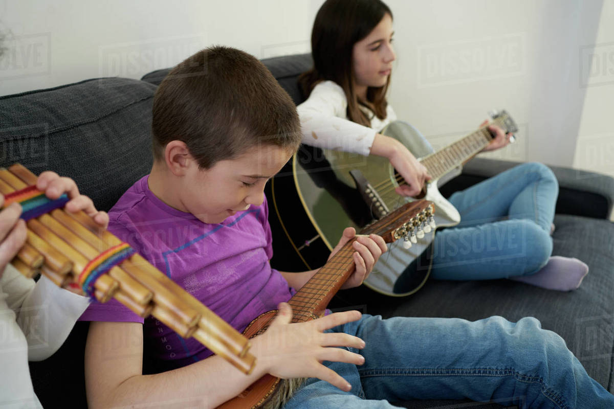 Group of young kids playing music instruments - Royalty-free Stock ...