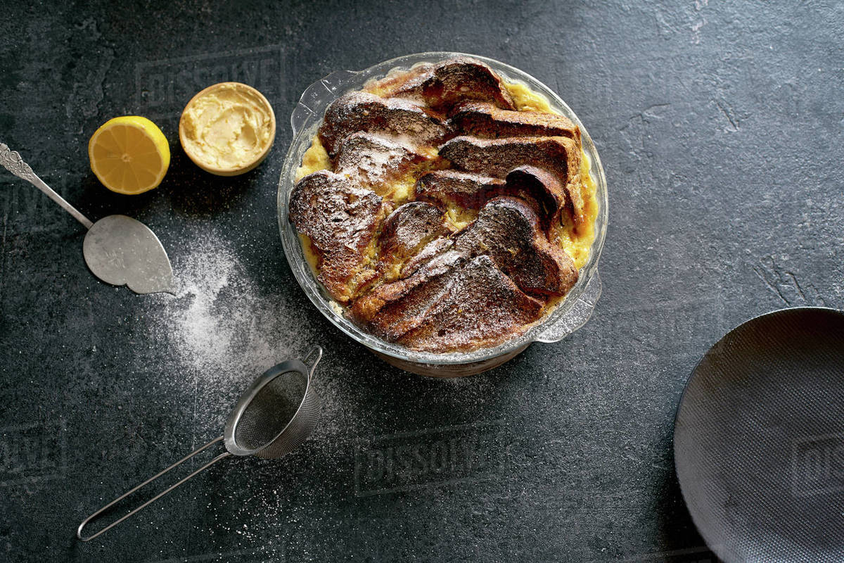 Top view of traditional bread pudding with custard, served with ...
