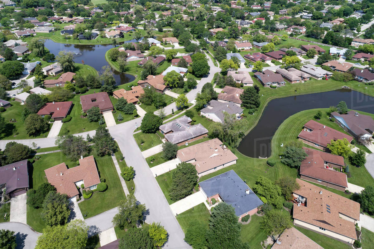Aerial view of a neighborhood in suburban Chicago with two ponds ...