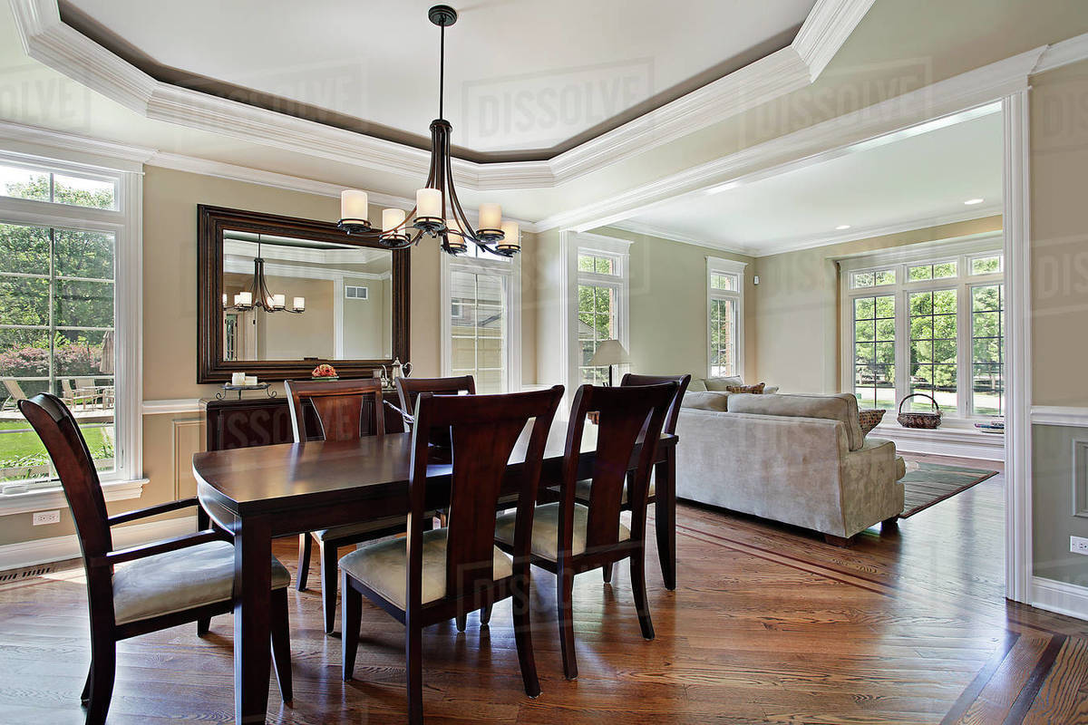 Dining room in luxury home with view into living area - Royalty-free ...