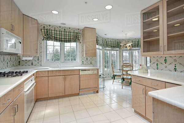 Kitchen in suburban home with eating area. - Royalty-free Stock Photo ...