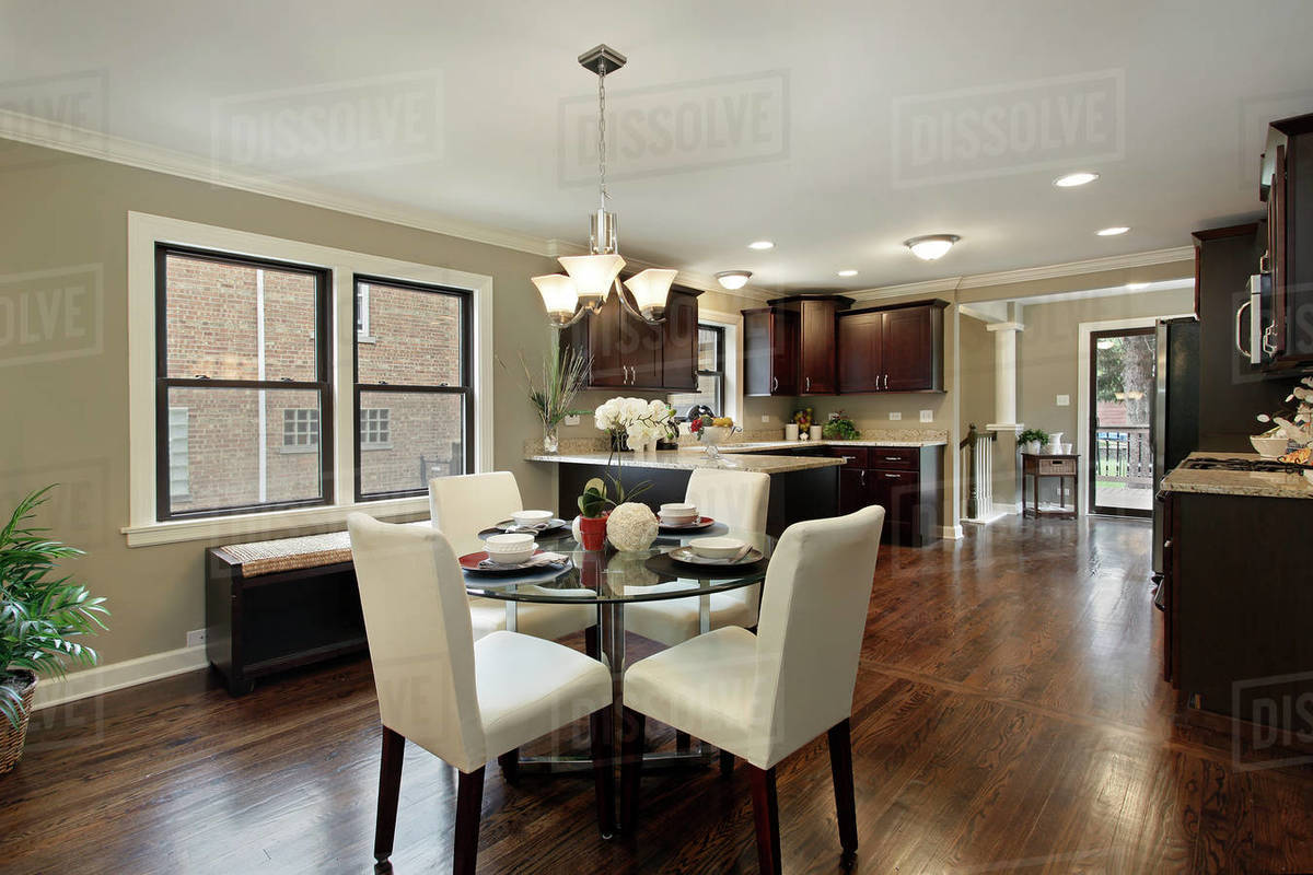 Kitchen in suburban home with large eating area. - Royalty-free Stock ...