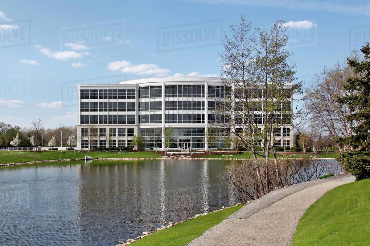 Office building in suburbs with lake and path - Royalty-free Stock ...