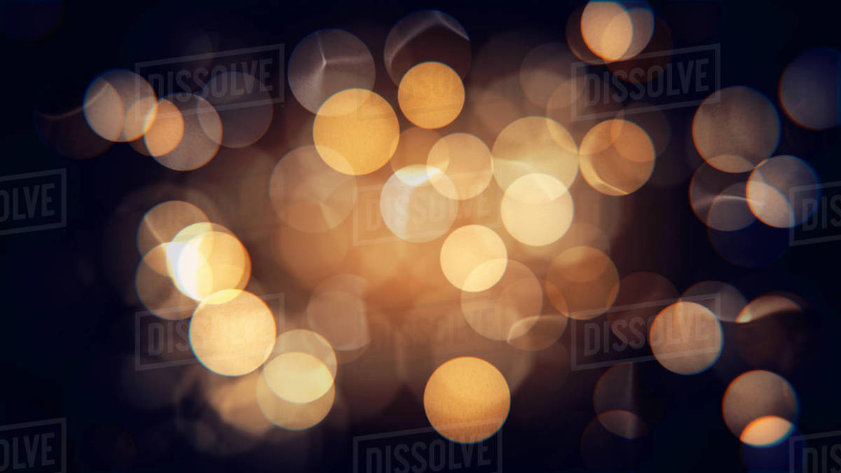 Abstract isolated blurred festive red and pink Christmas lights with bokeh - Stock Photo - Dissolve