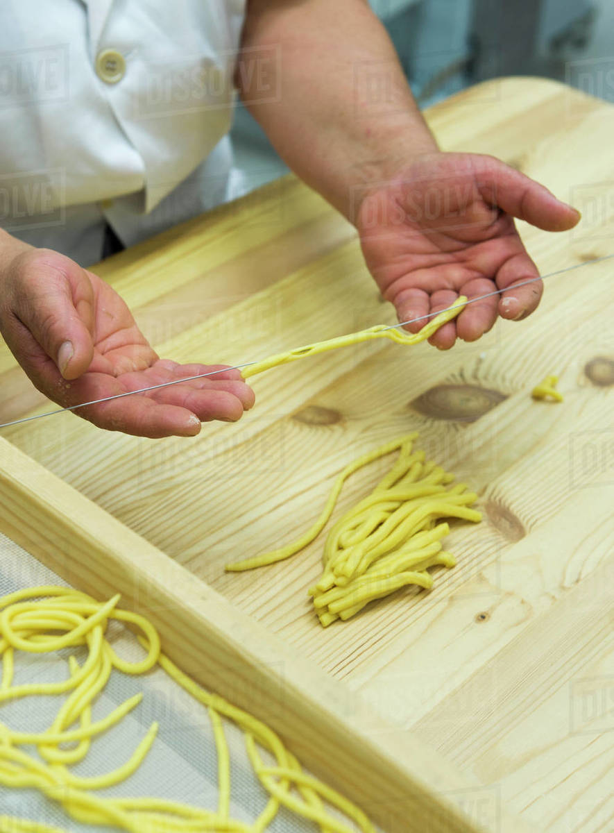 Hand making fusilli, typical Cilento food, Felitto, Cilento, Campania ...