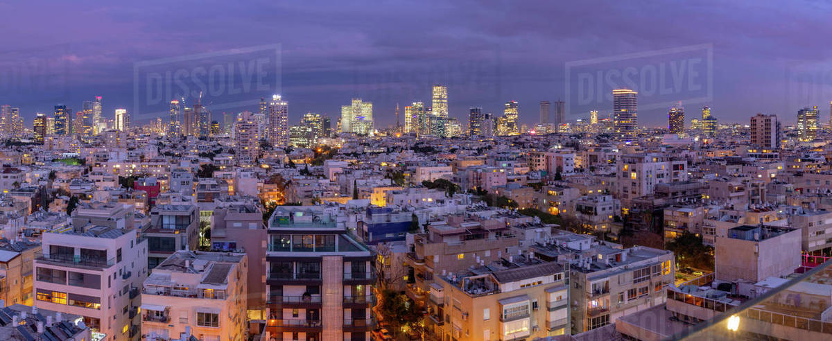 Elevated view of Tel Aviv skyline at dusk, Jaffa visible in the ...