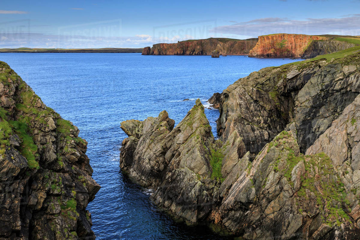 Ness of Hillswick, dramatic jagged cliffs, and red granite cliffs of ...