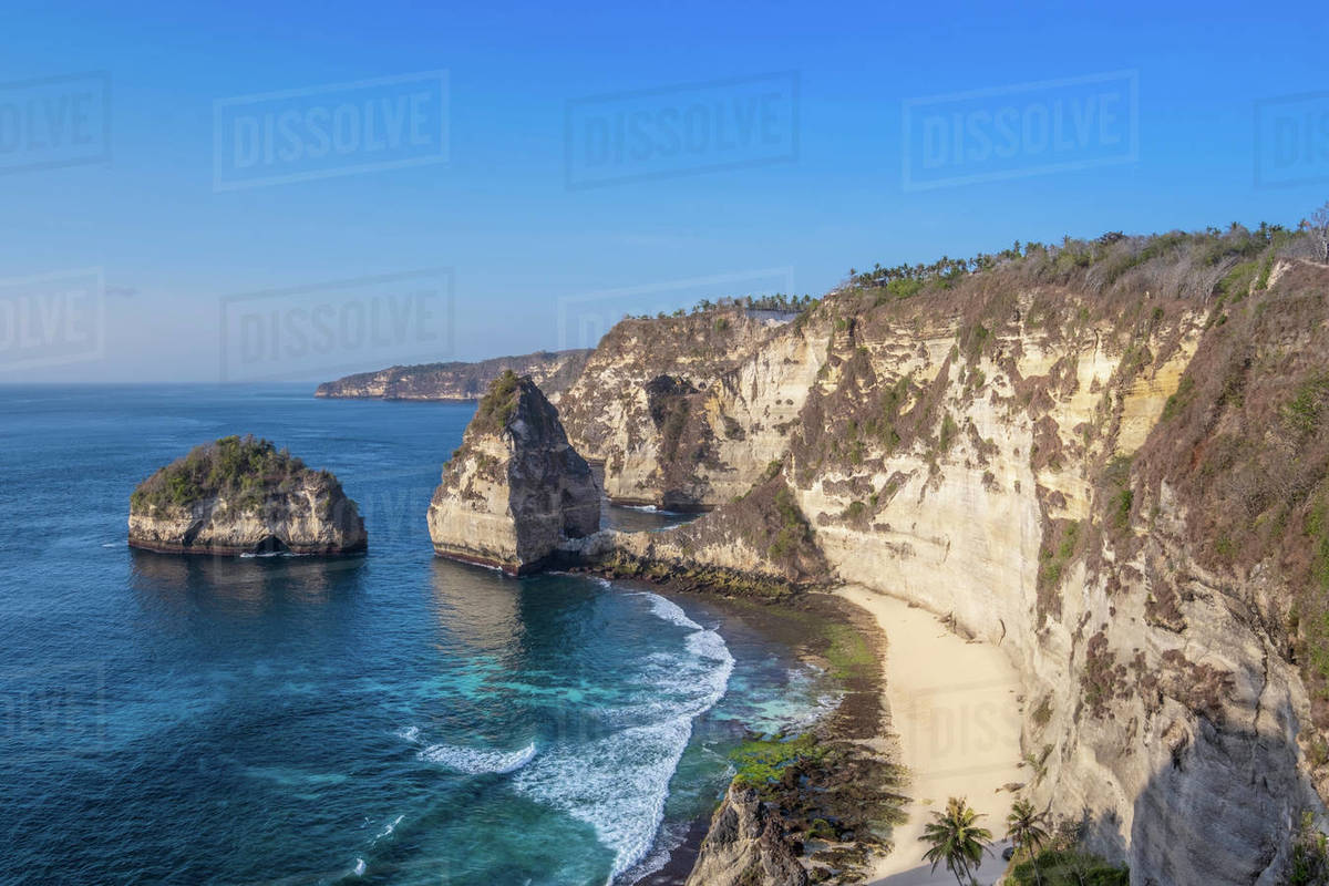 View of Atuh beach and sandstone cliffs, Nusa Penida Island, Bali ...