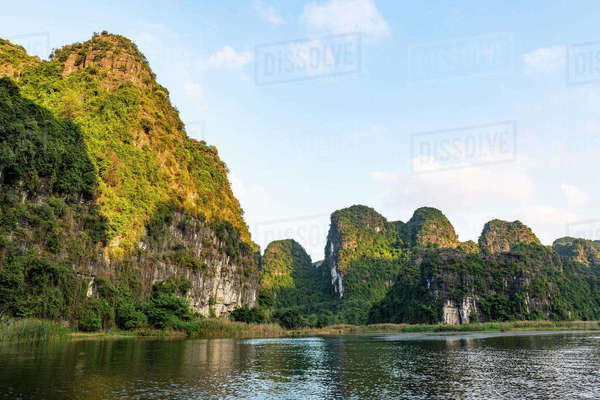 Limestone mountains in the scenic Trang An Landscape Complex, UNESCO ...