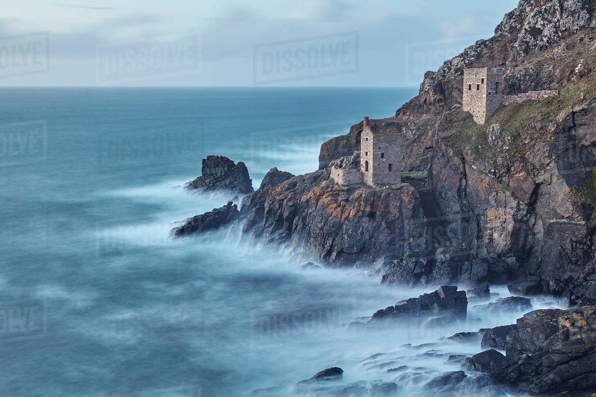 A dusk view of the iconic cliffside ruins of Botallack tin mine, UNESCO ...