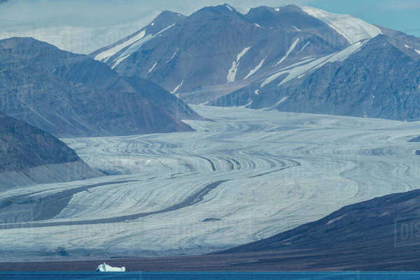 Tidewater glaciers and ice-capped mountains in Eclipse Sound, Nunavut ...