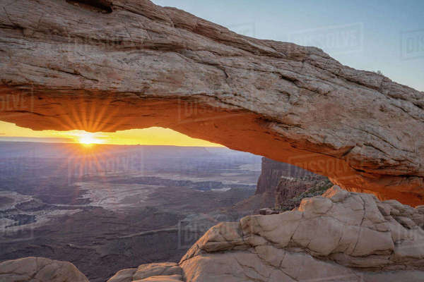 Close up view of canyon through Mesa Arch at sunrise, Canyonlands ...