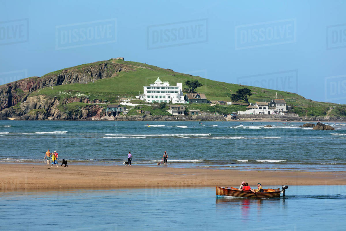 Burgh Island and hotel viewed across Bantham Sand beach at low tide ...