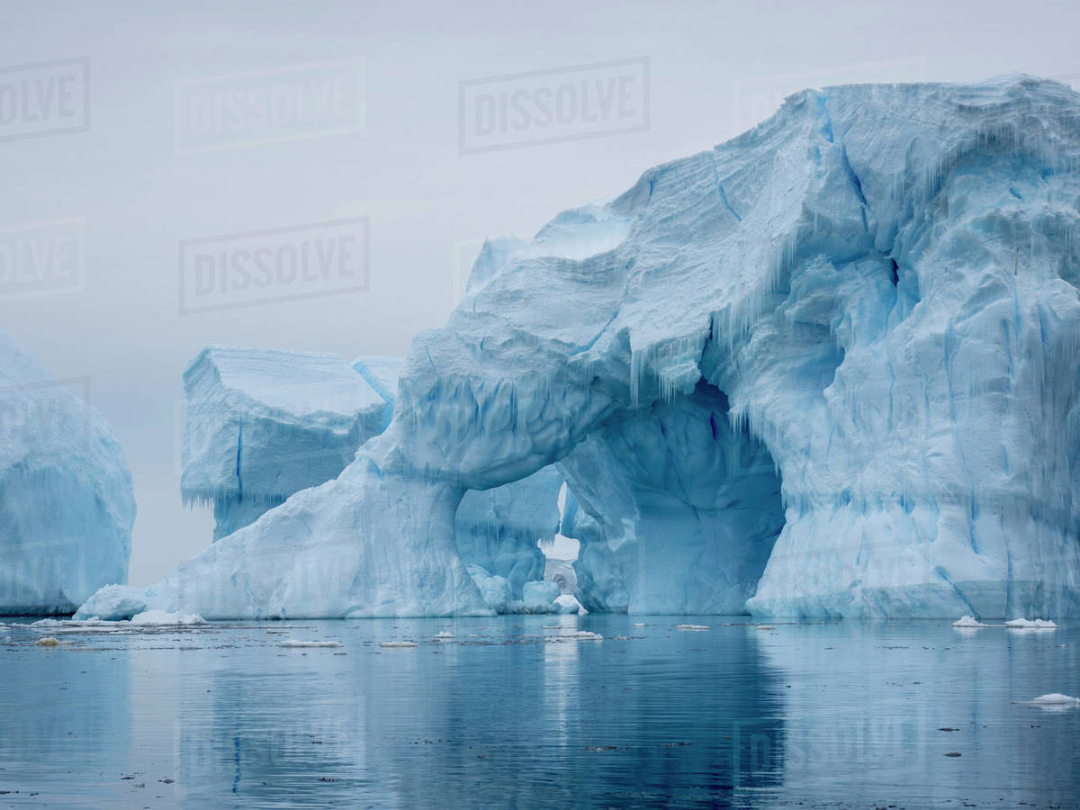 Large iceberg grounded on a reef at Peter I Island, Bellingshausen Sea ...