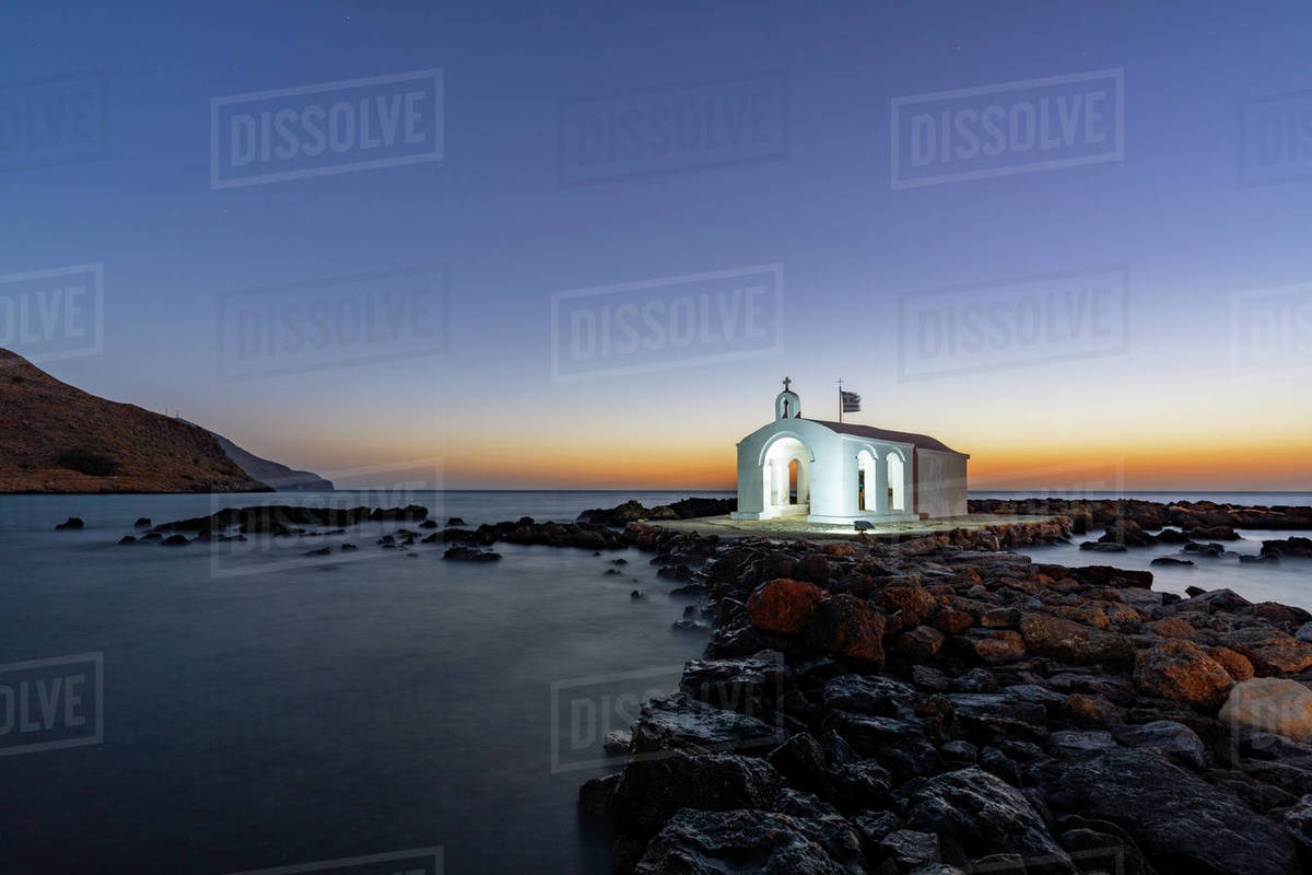 Whitewashed church of Agios Nikolaos at dusk, Georgioupolis, Crete ...