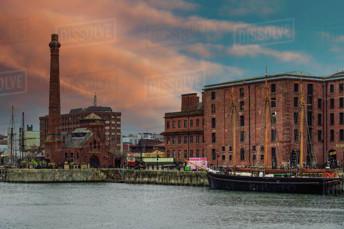Evening view of Royal Albert Dock brick and stone buildings and ...