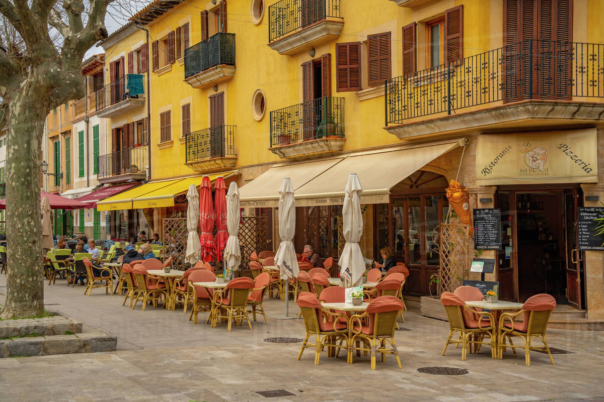 View of cafe and bar in old town Arta, Arta, Majorca, Balearic Islands ...