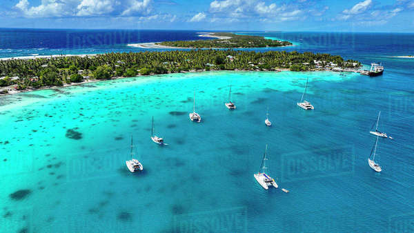 Aerial of the Rangiroa atoll and the Tiputa Pass, Tuamotus, French ...
