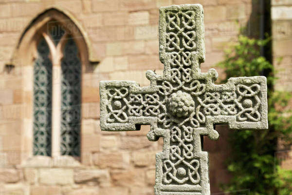Anglo-Saxon Cross in the churchyard of St. Aidan's Church, a 12th ...