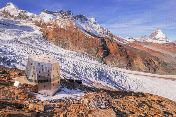Monte Rosa hut (hutte) with the Matterhorn pyramid in the background ...