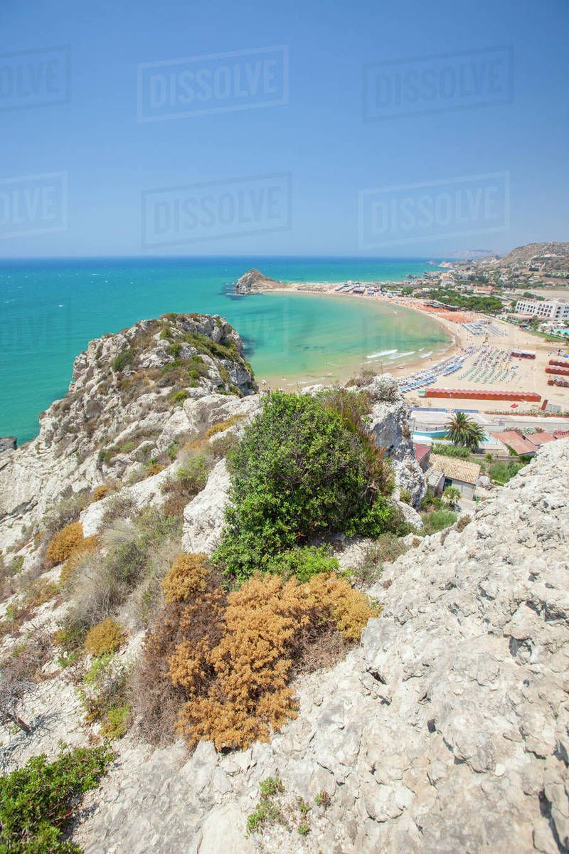 The cliffs frame the turquoise sea and the sandy beach of Licata ...